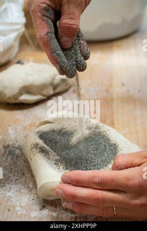 Mountain of clay and sea Stock Photo - Alamy