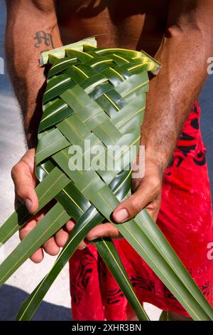 French Polynesia, Bora Bora island, Rosto, Polynesian guide wearing a ...