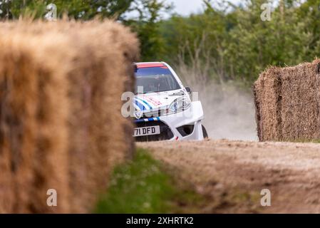 Proton Iriz R5 rally car on the rally stage at the Goodwood Festival of ...