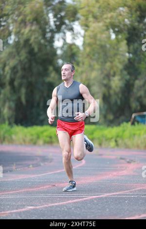 Determination Of An Athlete Making A Run Training Stock Photo - Alamy