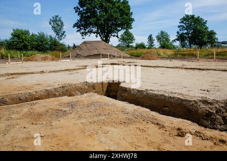 Dugged holes on a construction site. Building house concept Stock Photo ...