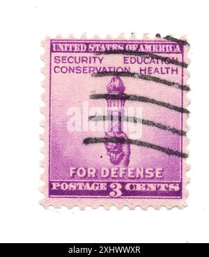 A vintage Defence postage stamp from the USA on a white background ...