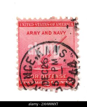 A vintage Defence postage stamp from the USA on a white background ...