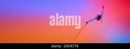 Banner. Fencer in uniform and mask in impressive leap, holding rapier ...