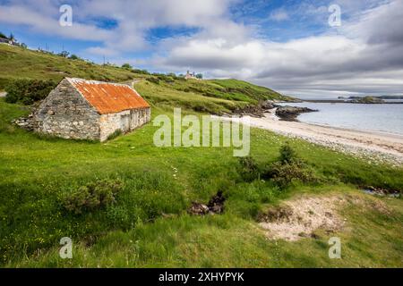 The beach at Talmine on Tongue Bay with an old Fishing hut in the ...