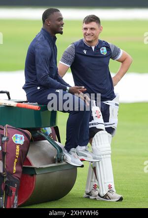 West Indies' Jayden Seales (right) celebrates after England's Joe Root ...