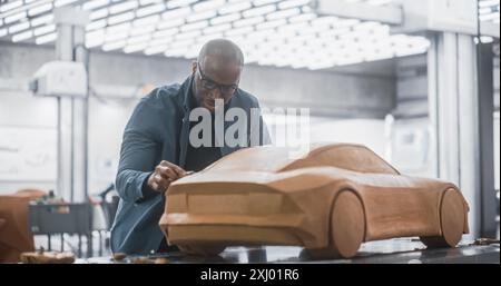 Portrait of an Automotive Artist Making Final Strokes on His Latest ...