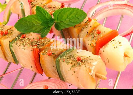 Raw fish brochettes Stock Photo - Alamy