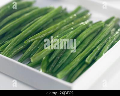 Cooked string beans Stock Photo - Alamy