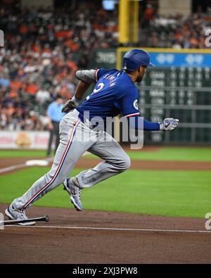 Texas Rangers second base Marcus Semien (2) bats in the seventh inning ...