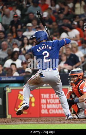 Texas Rangers second base Marcus Semien takes a practice throw down to ...
