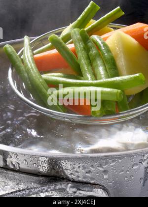Cooking vegetables in boiling water Stock Photo - Alamy