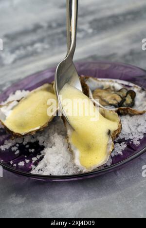 Oysters with sabayon Stock Photo - Alamy