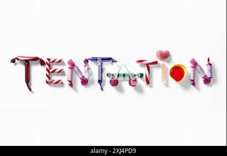 Temptation written with candies Stock Photo - Alamy