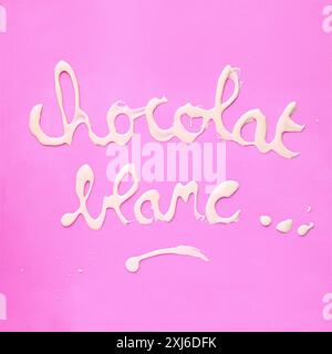 Chocolate written with melted chocolate Stock Photo - Alamy