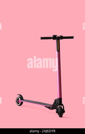Pink modern electric kick scooter on white background Stock Photo - Alamy