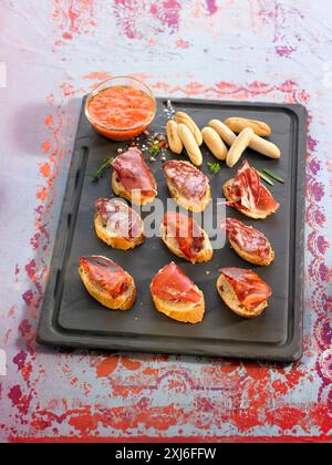 Spanish cold cuts on sliced bread Stock Photo - Alamy