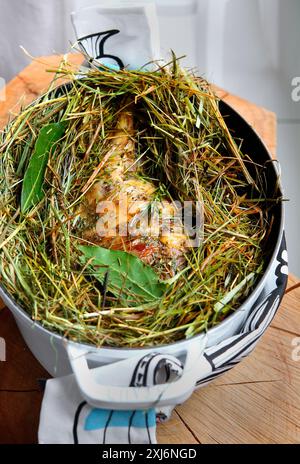 Leg of lamb cooked in hay Stock Photo - Alamy