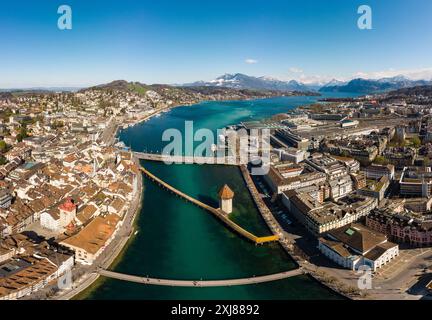 An aerial drone footage of the Lake Lucerne in distance, Central ...