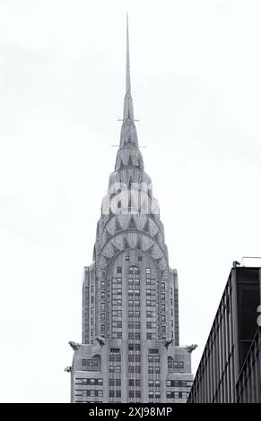 The stylish metal spire of the Chrysler Building, an American Art Deco ...