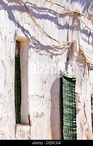 Electrical wiring on a white façade in Alhambra Stock Photo - Alamy