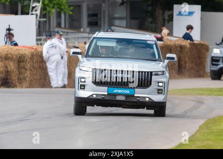 2024 Omoda Jaecoo 7 driving up the hill climb track at the Goodwood ...