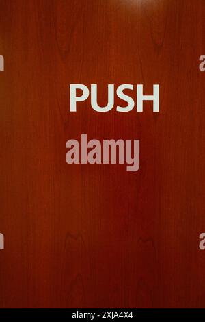 Push sign on wooden door, USA Stock Photo - Alamy