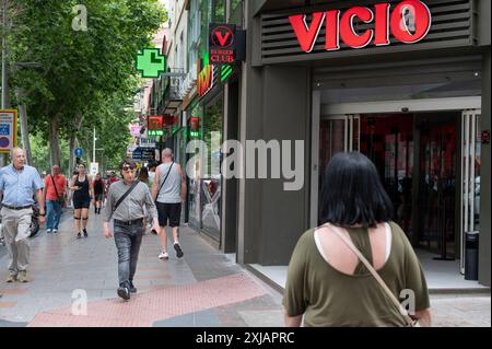 Pedestrians walk past the Spanish hamburger fast food restaurant chain ...