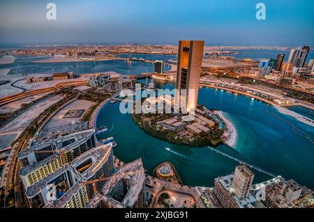 Manama, Bahrain at sunset showing megacity skyline, skyscrapers, modern ...