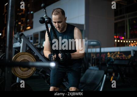 Working out in fitness center Stock Photo - Alamy
