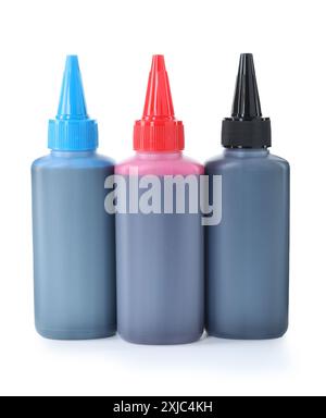 Bottles of different printer ink isolated on white Stock Photo - Alamy