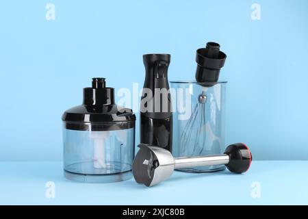 Hand electric blender on a light blue background with copy space Stock ...