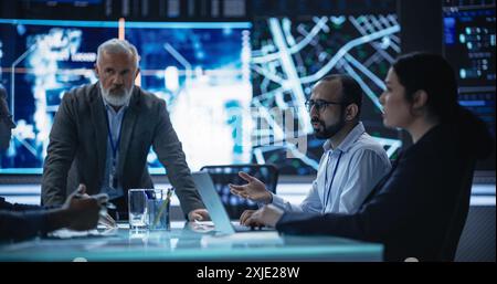 Team of Surveillance Experts Having a Meeting in a Secret Service ...