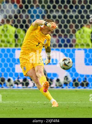 Jordan Pickford (England) controls the ball during England and Croatia ...
