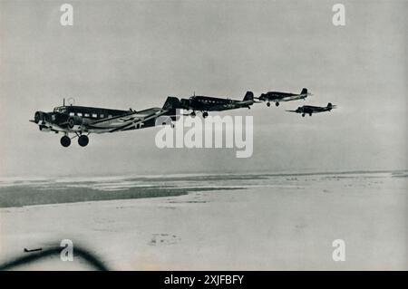 A photograph shows a formation of Junkers Ju 87 (Stuka) aircraft ...