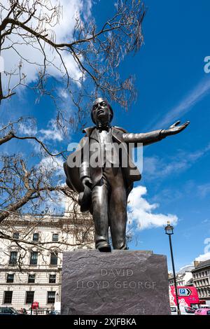 Bronze statue of Liberal prime minister David Lloyd George in suit and ...