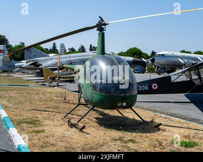 The Robinson R22 is a two-bladed, single-engine light utility ...