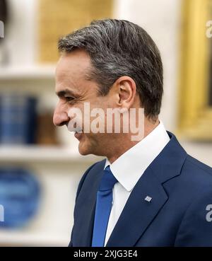 Prime Minister of Greece, Kyriakos Mitsotakis arrives to pose for a ...