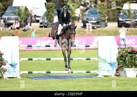 Martin FUCHS of Switzerland with Commissar pezi during the Saut Hermès ...