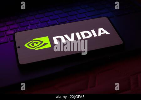 In this photo illustration, the Nvidia Corporation logo is displayed on ...