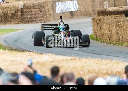 1976 Lotus-Cosworth 77 Formula 1 racing car driving up the hill climb ...
