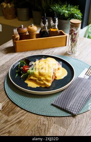 Eggs Benedict on French bread Stock Photo - Alamy