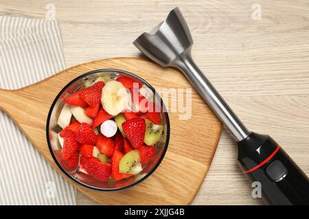 strawberries on wooden chopper board Stock Photo - Alamy