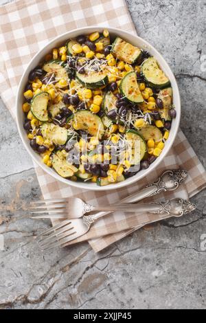 Homemade Garlic Parmesan Grilled Corn on a Plate, side view. Space for ...