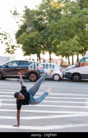 Man is doing modern dance on a white background Stock Photo - Alamy