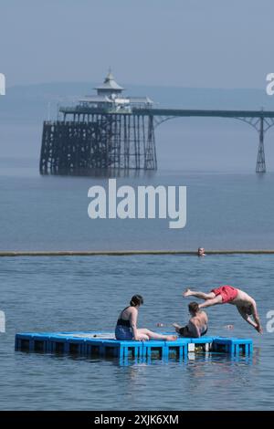 People enjoy the water at Clevedon Marine Lake in Somerset as high ...