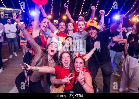 Group of fans at the Adidas fan zone at the Bundestag after the final ...