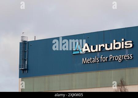 Logo and lettering Aurubis Metal for Progress on a factory building at the Aurubis AG plant ...
