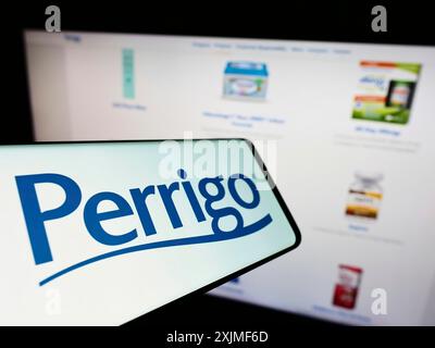 Mobile phone with logo of pharmaceutical manufacturer Perrigo Company ...