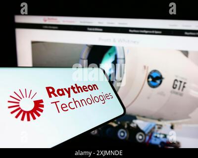Cellphone with logo of US company Raytheon Technologies Corporation on ...